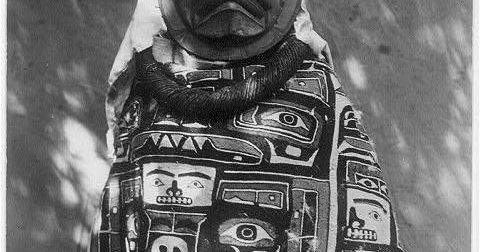 ‘A Tluwulahu costume, Qagyuhl — Woman wearing a fringed Chilkat blanket ...