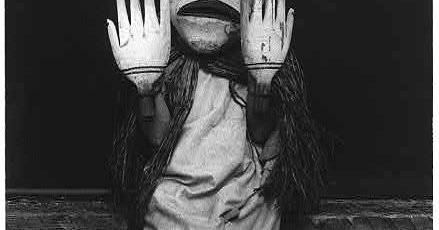 ‘Nuhlimkilaka, Koskimo — Kwakiutl person wearing mask and hands ...
